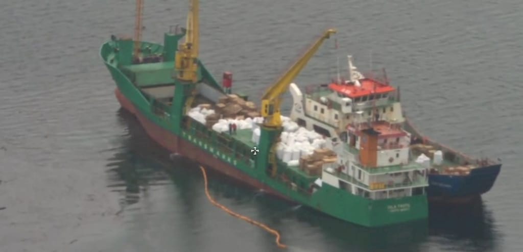 Stranded cargo ship carrying 2,000 tonnes of fish feed is freed in ...